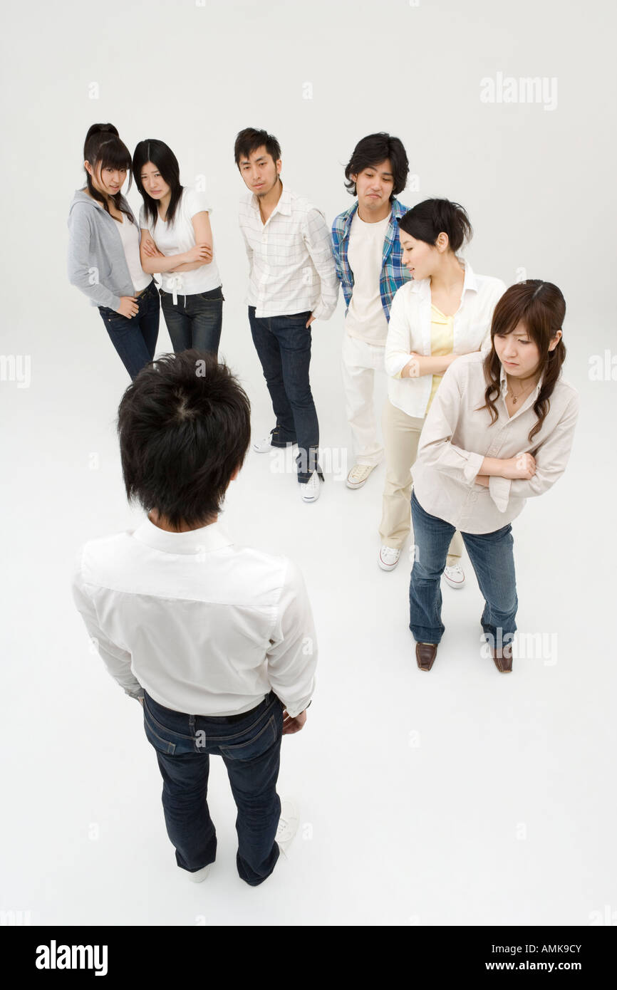 Young man excluded from group hi-res stock photography and images - Alamy