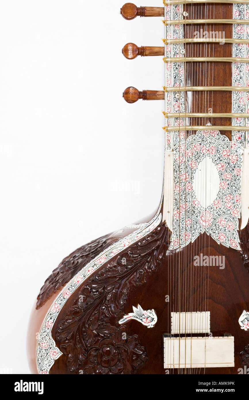 Indian sitar on white background Stock Photo - Alamy