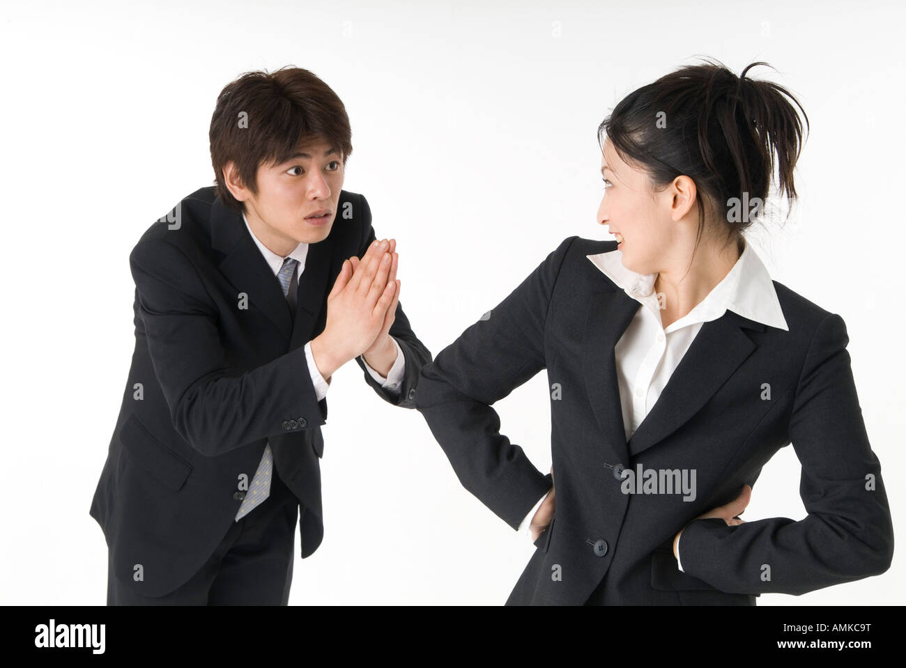 Young businessman apologizing Stock Photo - Alamy