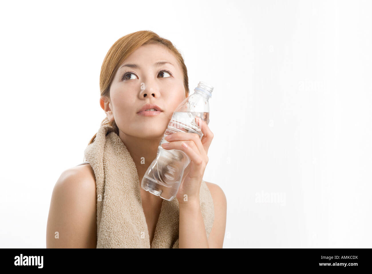 Young woman holding water bottle Stock Photo - Alamy Young woman holding water bottle Stock Photo - Alamy