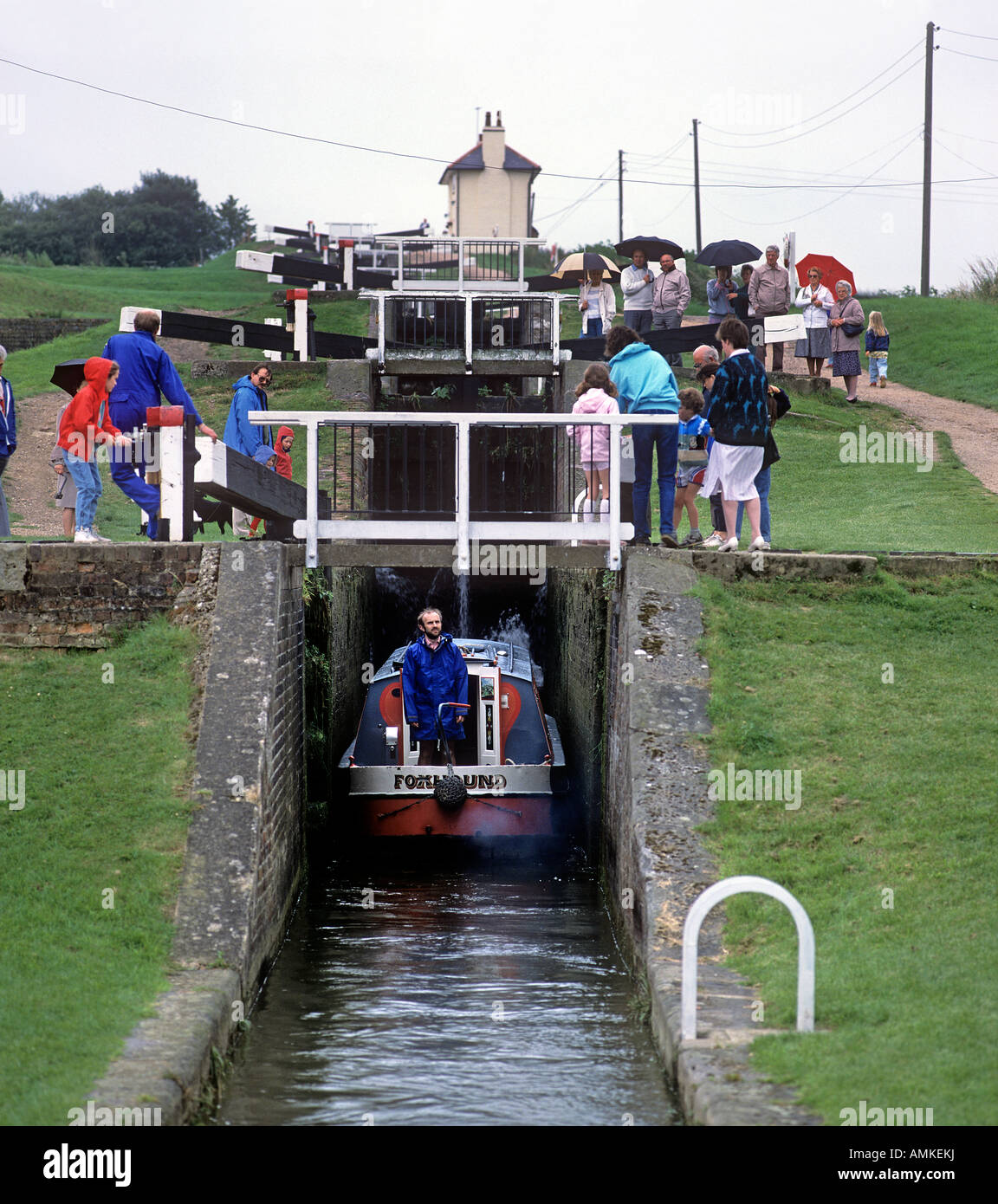 A canal boat entering Foxton Locks on the Grand Union Canal near Market ...