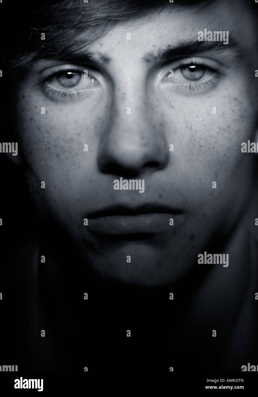 Close up of a teenage boy's face Stock Photo - Alamy