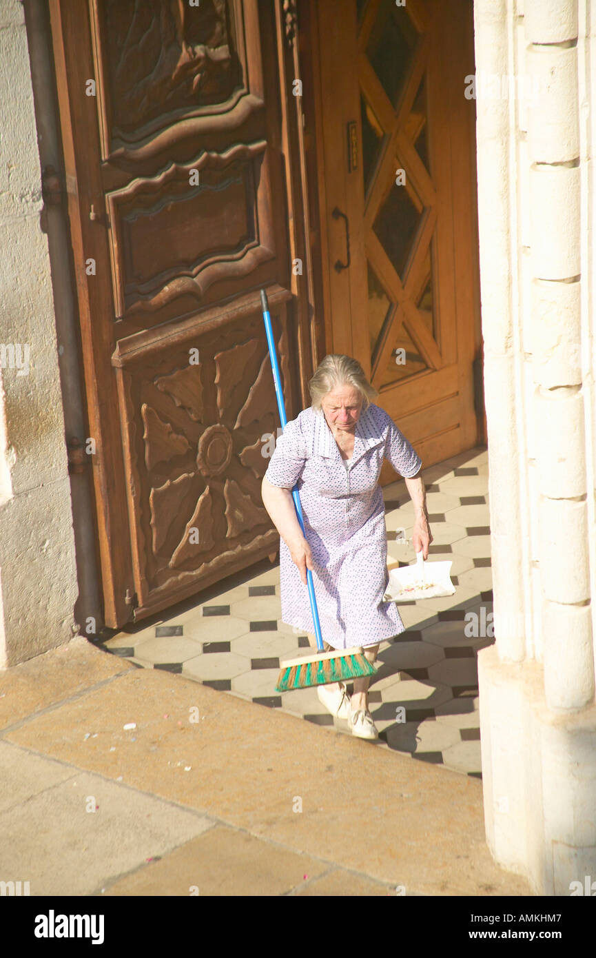 Woman cleaning up after party hi-res stock photography and images - Alamy
