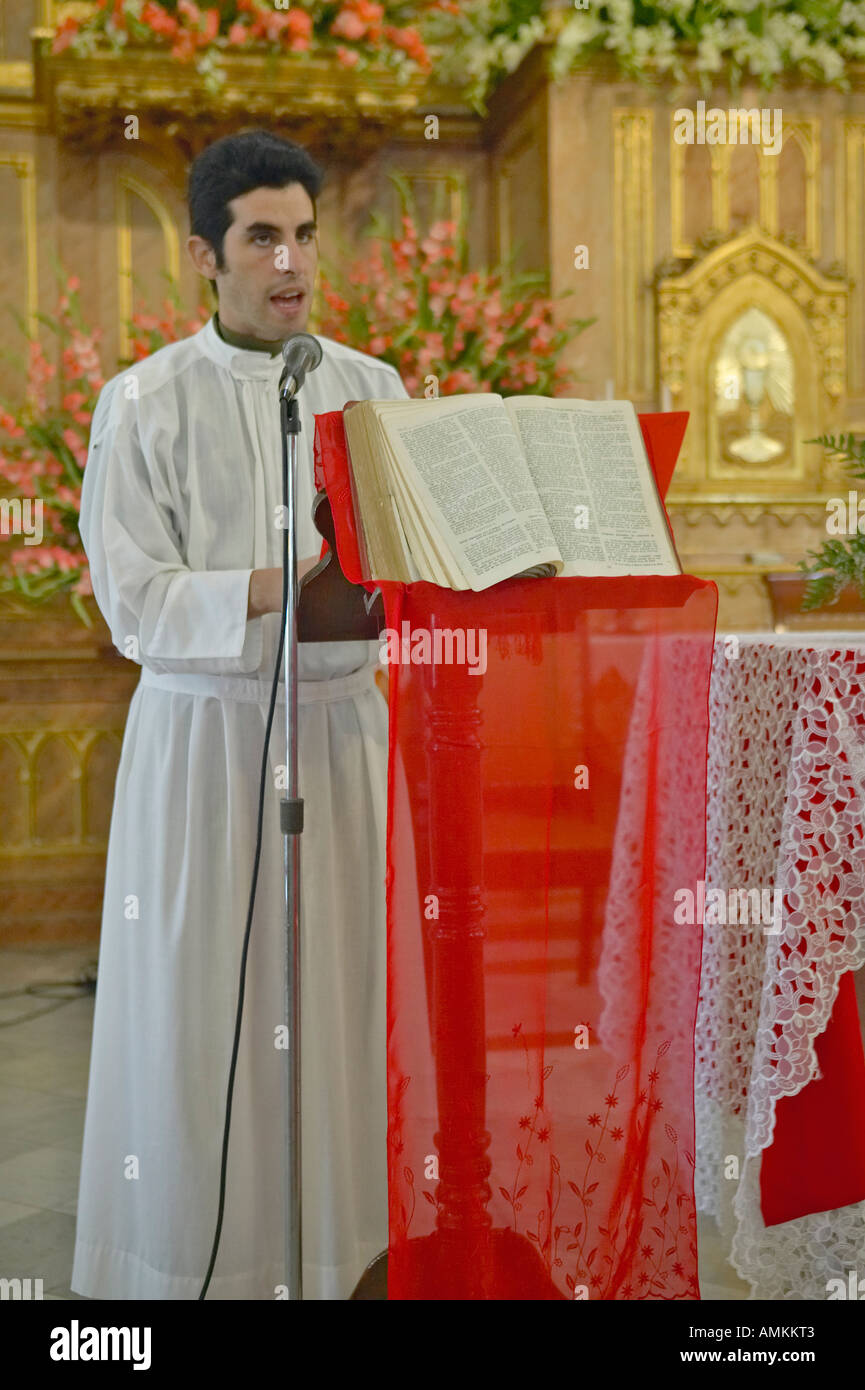 San Lazaro Catholic Church and priest in El Rincon Cuba Stock Photo - Alamy