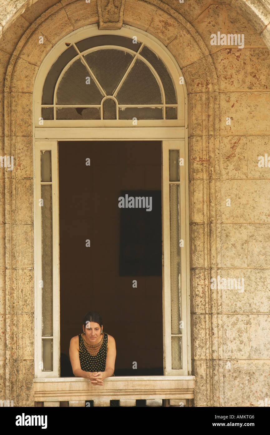 Caribbean woman looking out window hi-res stock photography and images ...