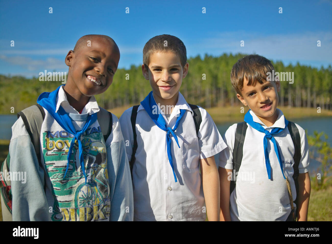 Young boys smiling and wearing school uniforms in Cuba Stock Photo - Alamy