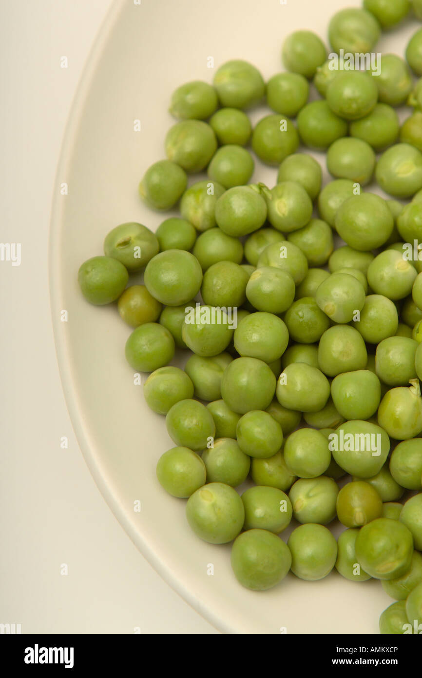 Fresh peas vegetable portion on plate Stock Photo - Alamy