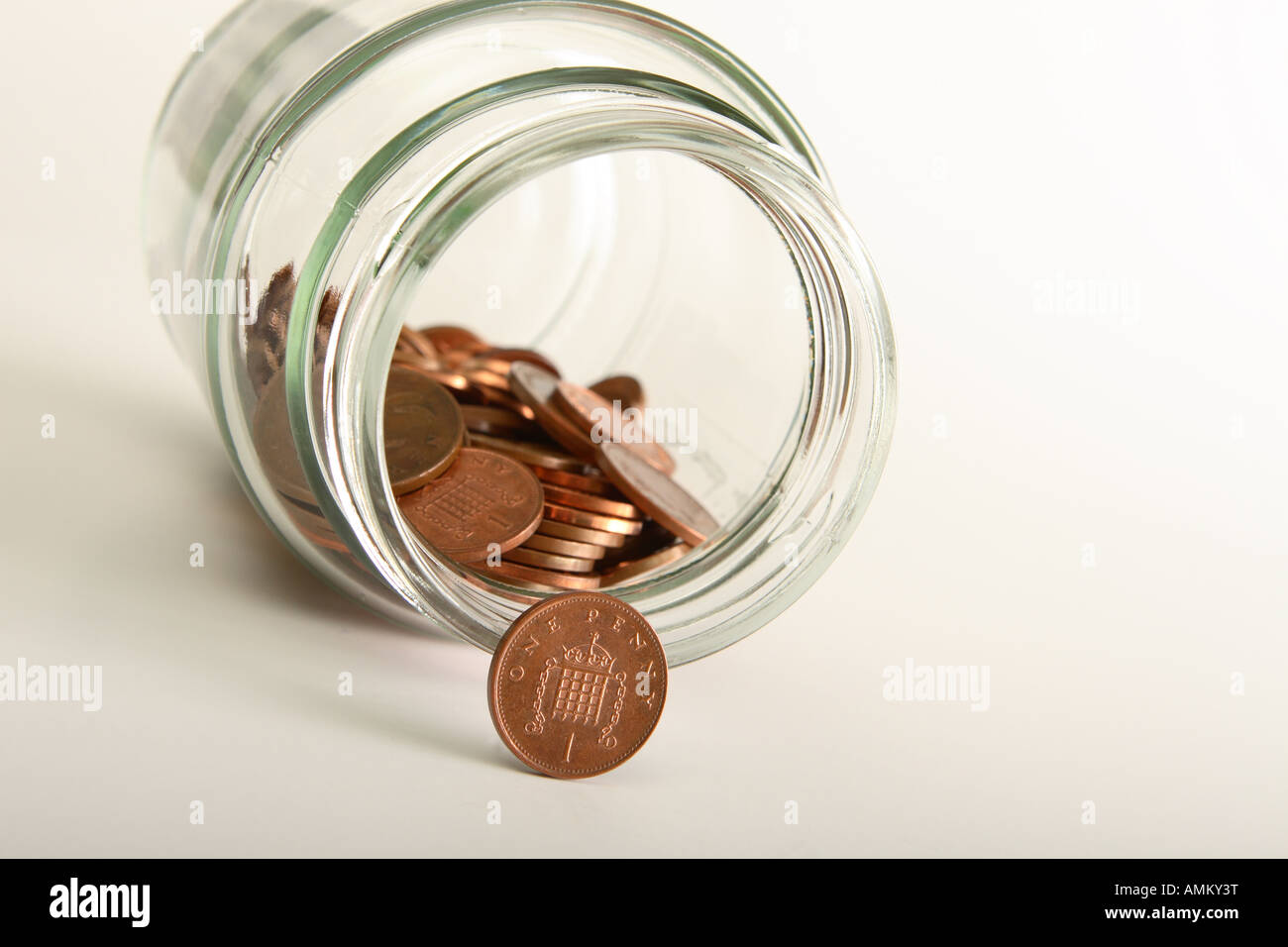 1p coins uk jar hi-res stock photography and images - Alamy