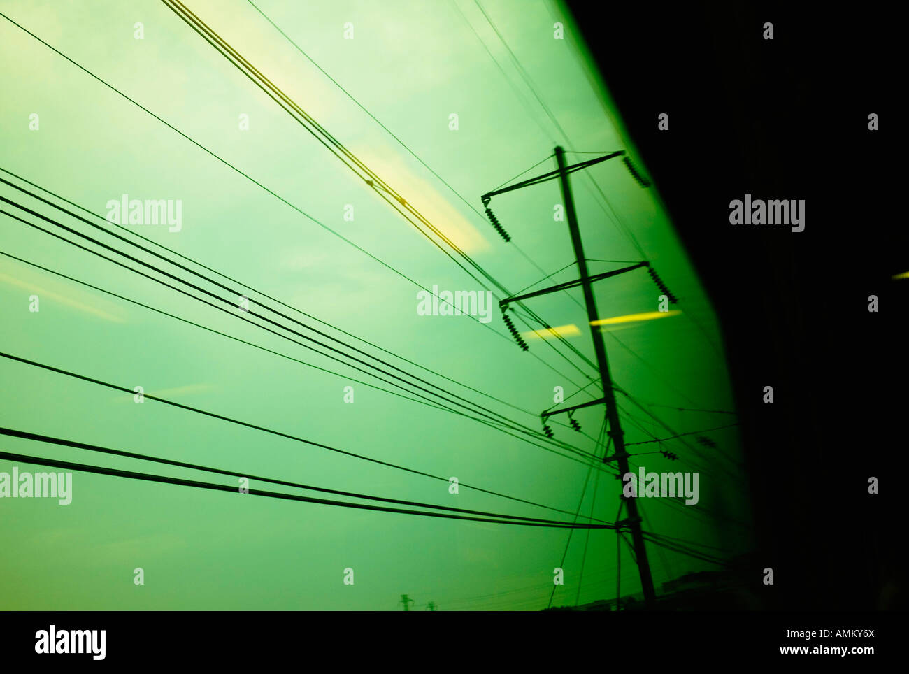 Electrical power line wires seen through a window of a Rapid transit ...