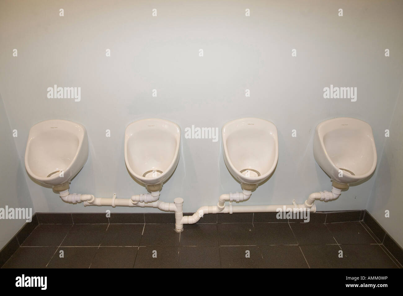 A gents urinal that is part of a waterless system using no water to ...