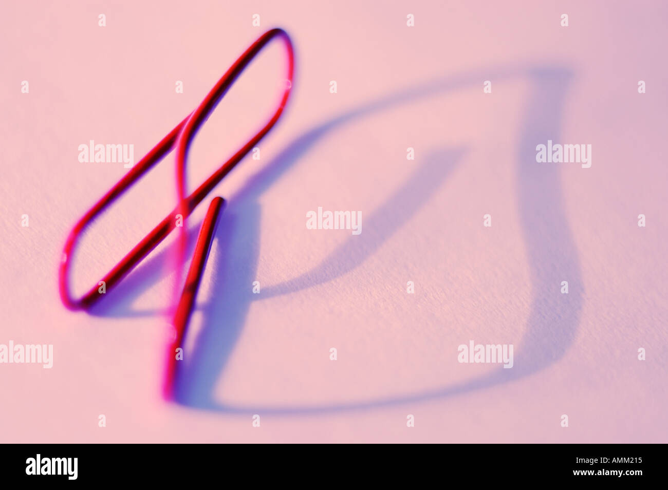 Paperclip and paper Stock Photo - Alamy