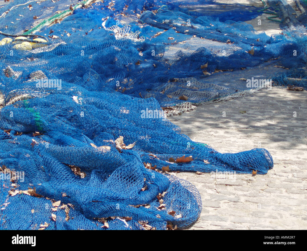 Fishing nets drying in sun hi-res stock photography and images - Alamy