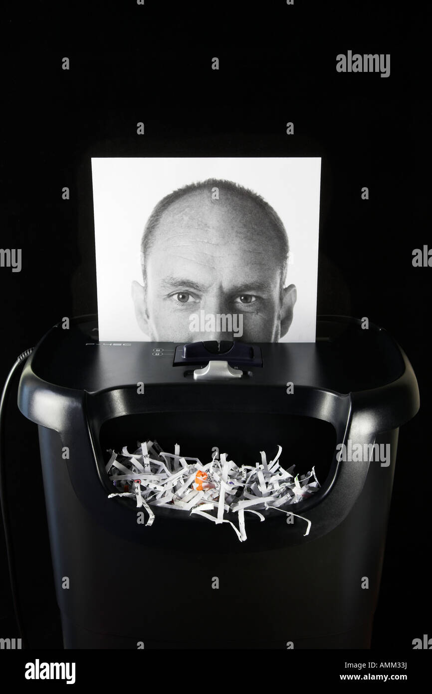 Paper shredder man hi-res stock photography and images - Alamy