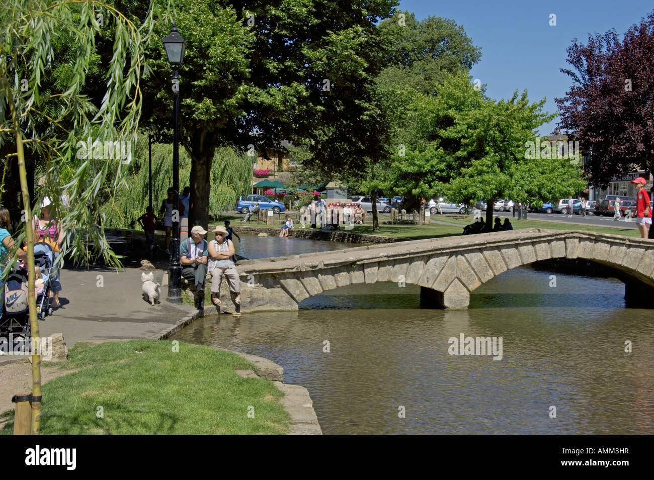 River Windrush runs through Bourton on the water Gloucestershire ...