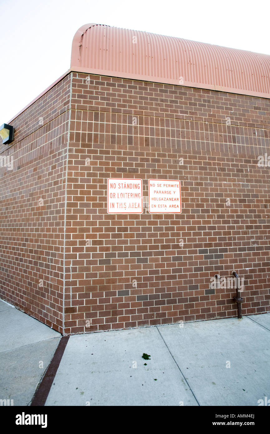 Signs in English and Spanish in prison yard. Omaha Correctional Center ...