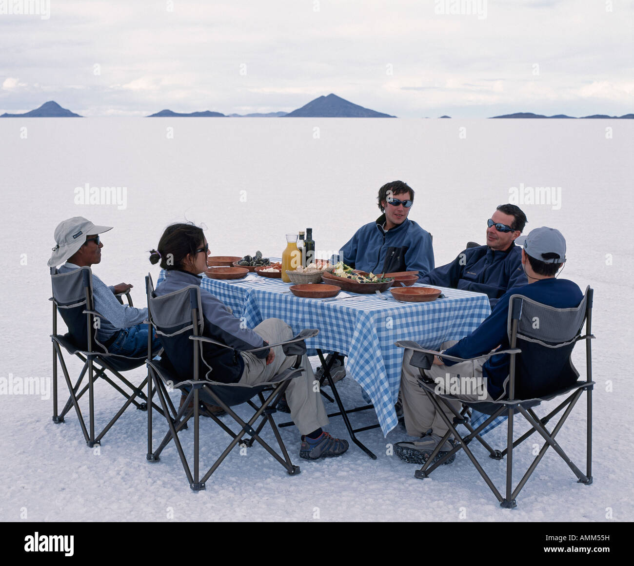 Guests on the Explora Traversia of southern bolivia enjoy lunch set out ...