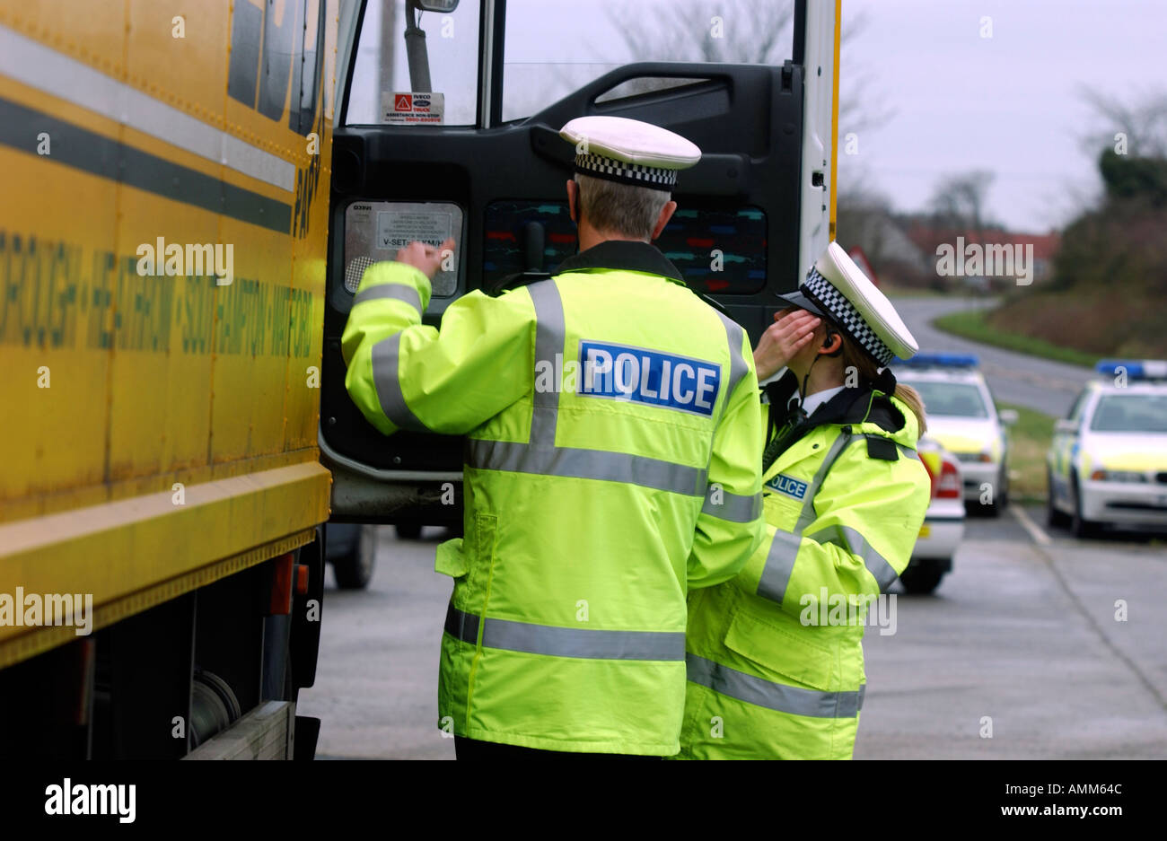 Traffic Police carrying out stop checks on vehicles Stock Photo - Alamy