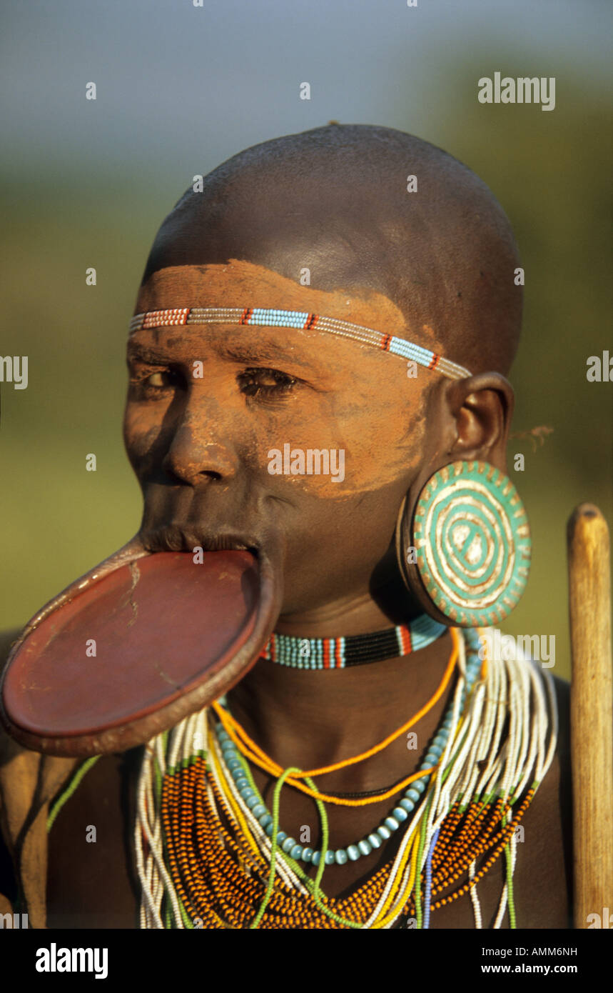 Portrait of a colorful Surma woman Stock Photo - Alamy