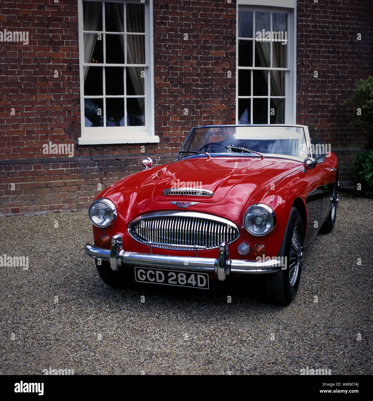 a red Austin-Healey sports car Stock Photo - Alamy