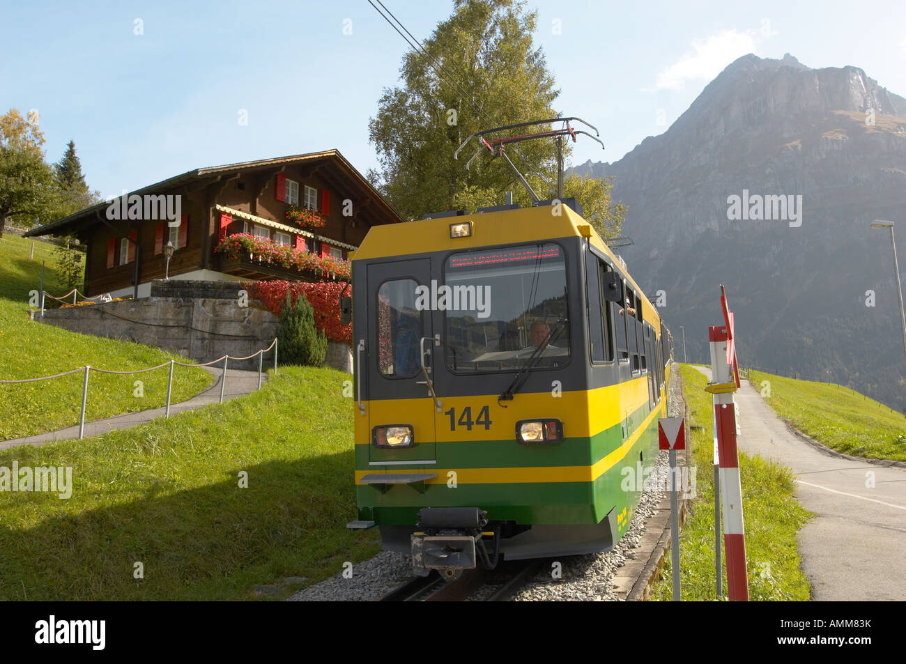 Grindelwald funicular railway with train. Swiss alps, Switzerland Stock ...