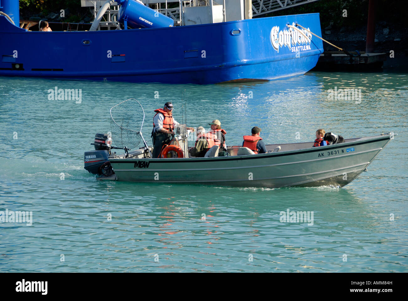 Fishermen in fishing boat Port Valdez Prince William Sound Alaska AK ...