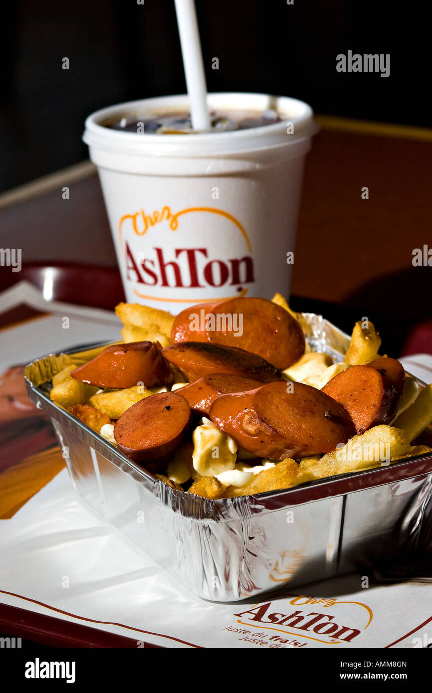 A sausages poutine from Chez Ashton with a cola Stock Photo - Alamy