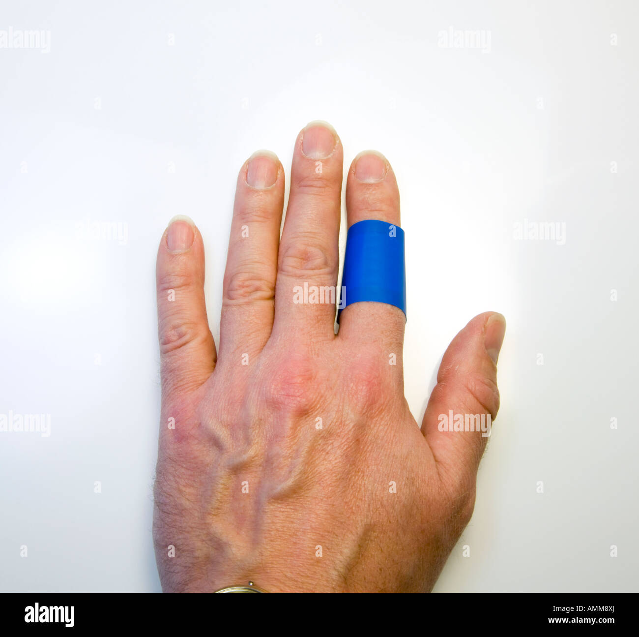 Blue plaster on hand Stock Photo - Alamy