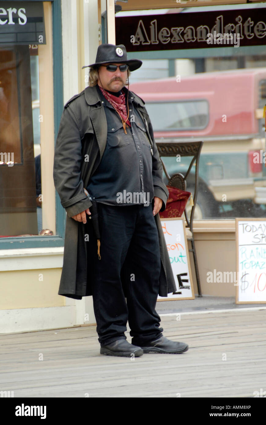 Character actor salesperson salesman attracts customers outside store ...