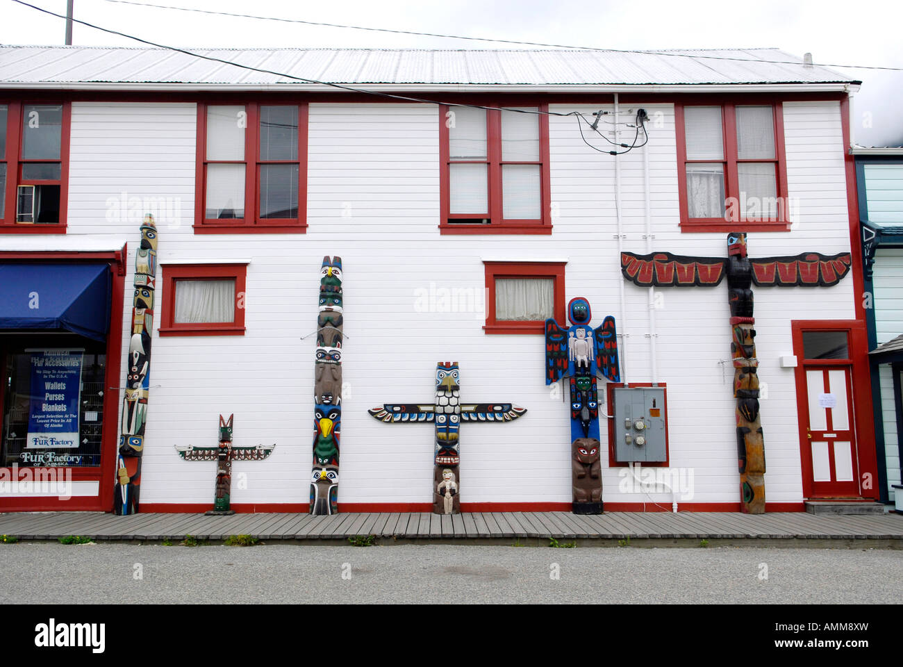 Totem poles outside shop store in Skagway Alaska AK United States US ...