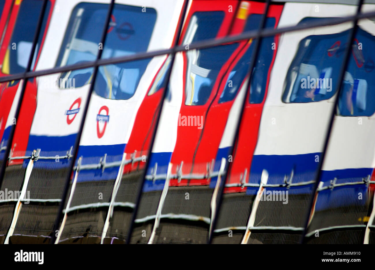 Reflected Tube Train on the Hammersmith and City line of the London ...