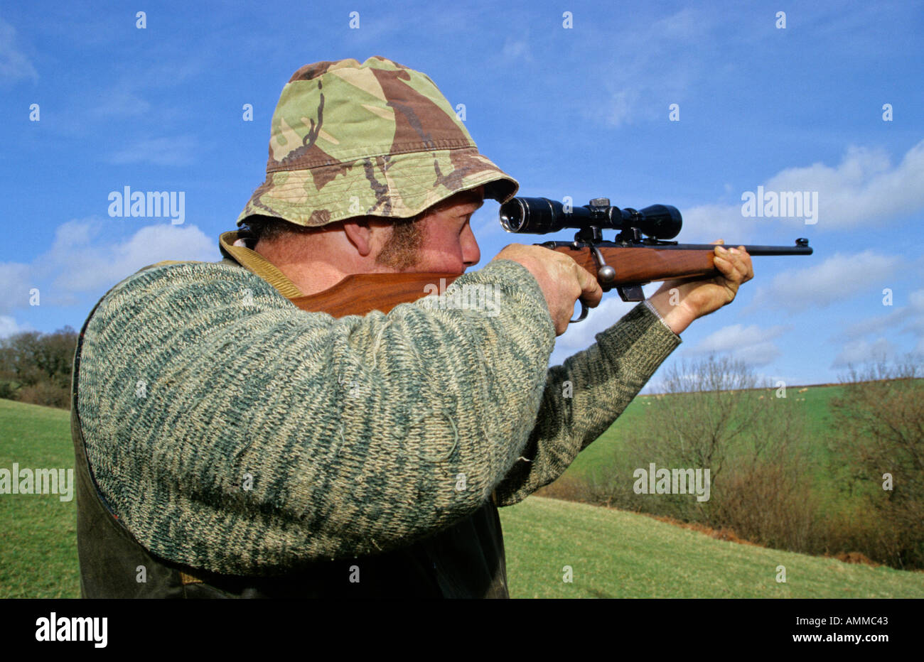Farmer with rifle hi-res stock photography and images - Alamy