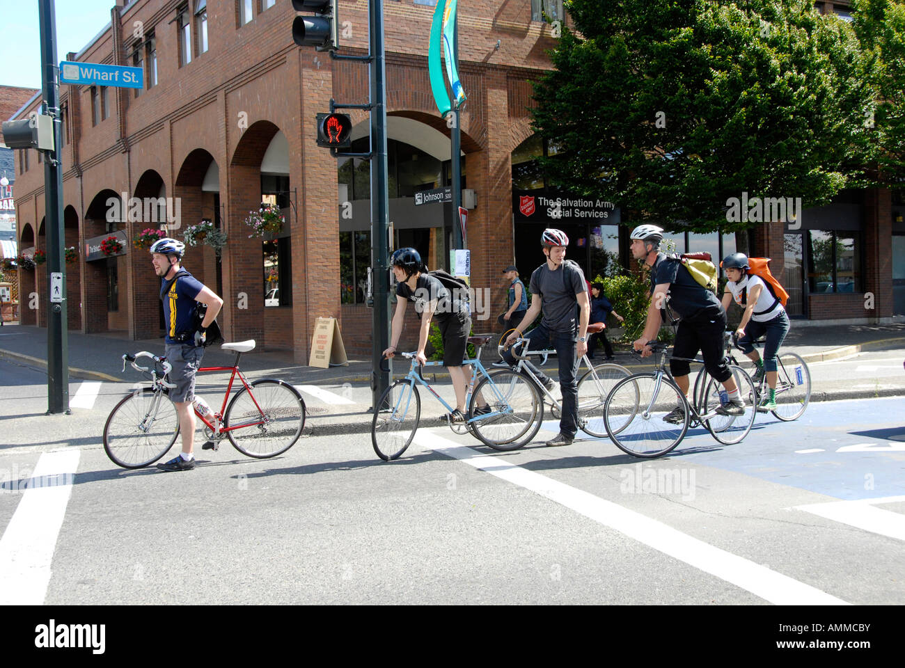 Bicyclists touring downtown Victoria British Columbia BC Canada tour ...