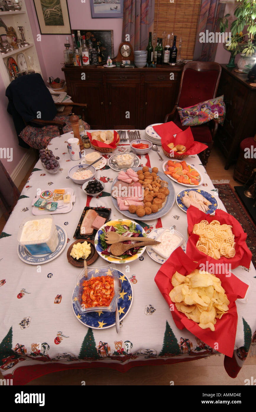 Buffet meal nibbles crisps chips ham cold meat salad salmon Stock Photo ...