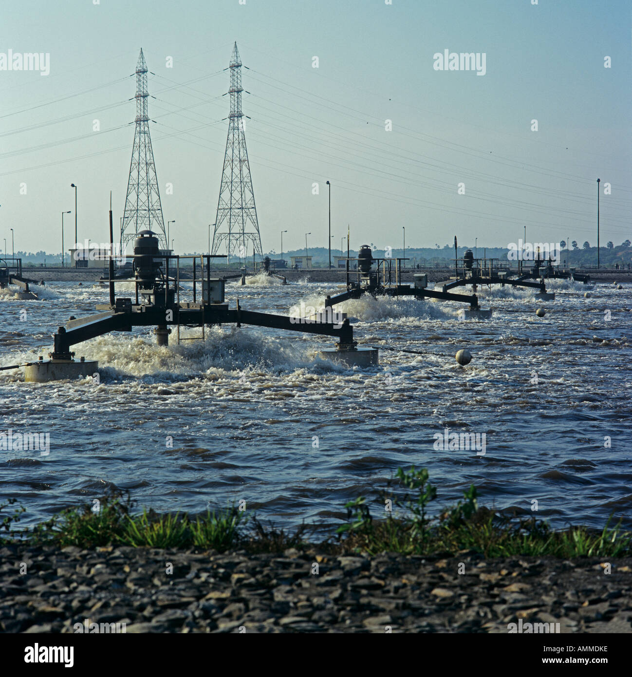 Floating aerators on sewage treatment lagoons, Mumbai, India Stock ...
