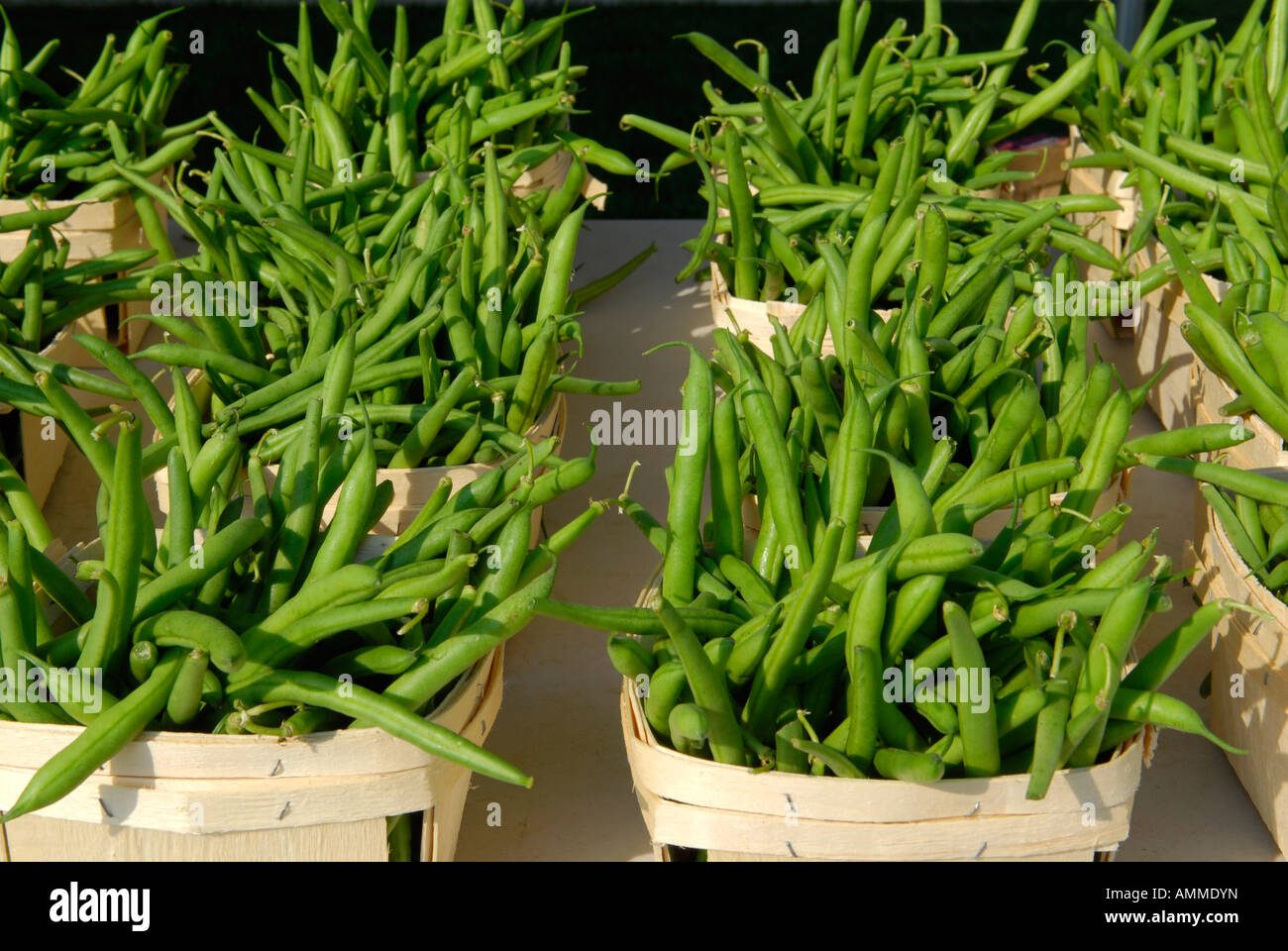 Fresh green beans and vegetables for sale at a roadside farmer market ...