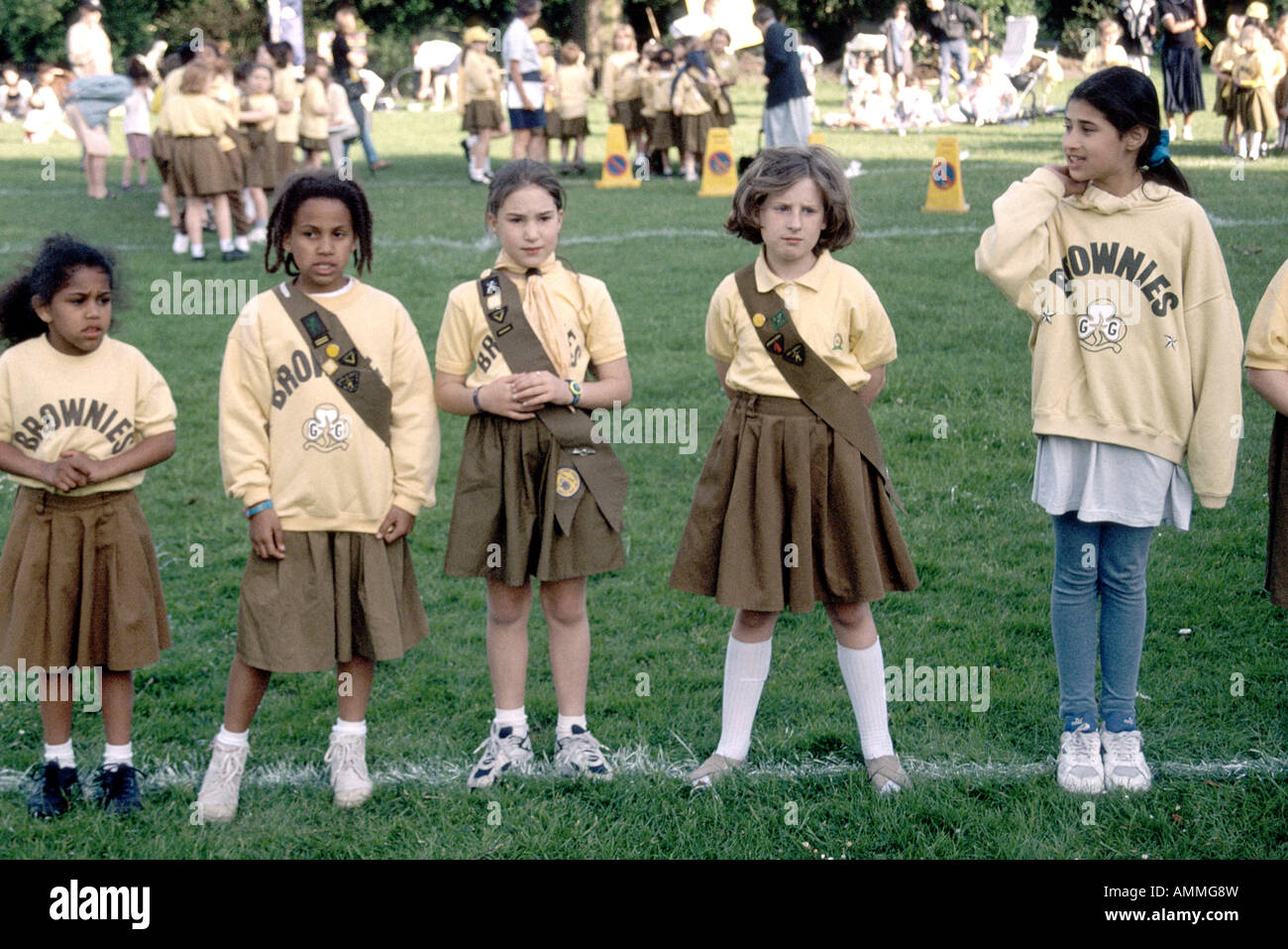 group of brownies in uniform preparing for a race Stock Photo - Alamy