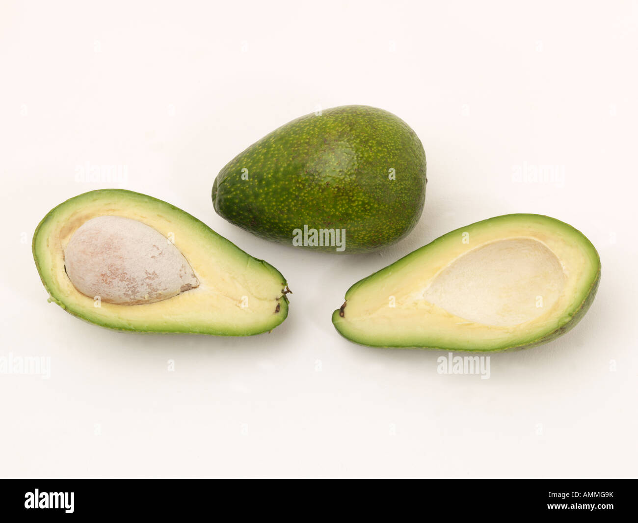 Avocado whole and Halves Stock Photo - Alamy
