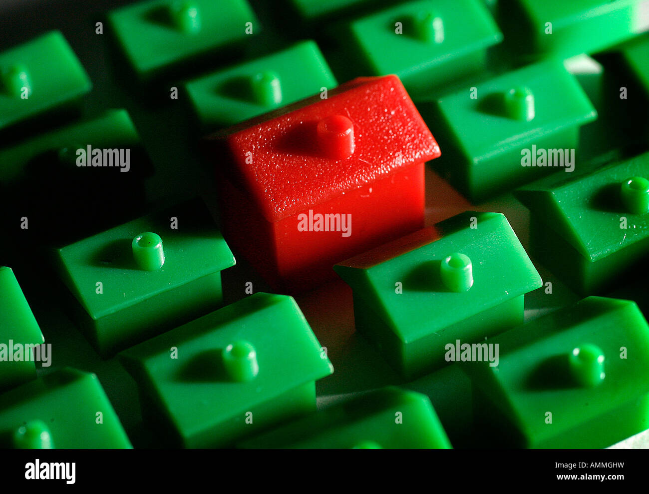 Monopoly house arranged in a pattern Stock Photo - Alamy