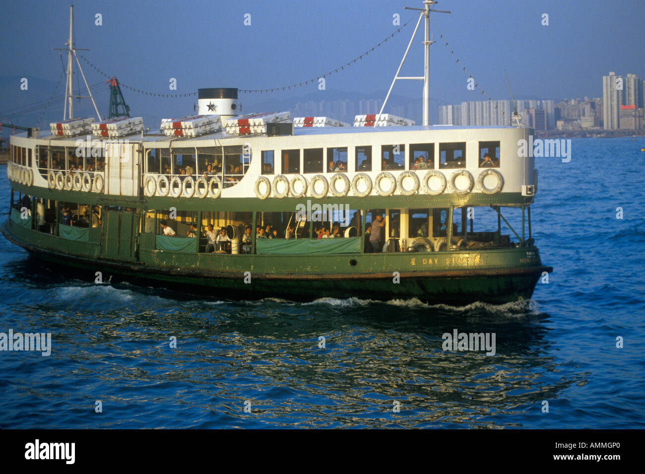 Star Ferry in Hong Kong Harbor with skyline in background Stock Photo ...