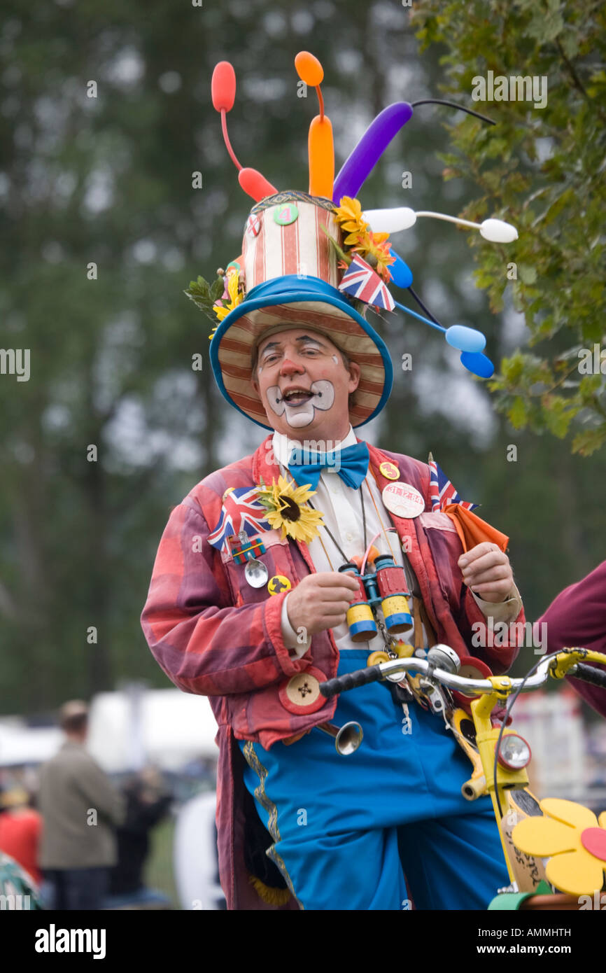 Closeup of tall colourful clown entertaining children Moreton Show ...
