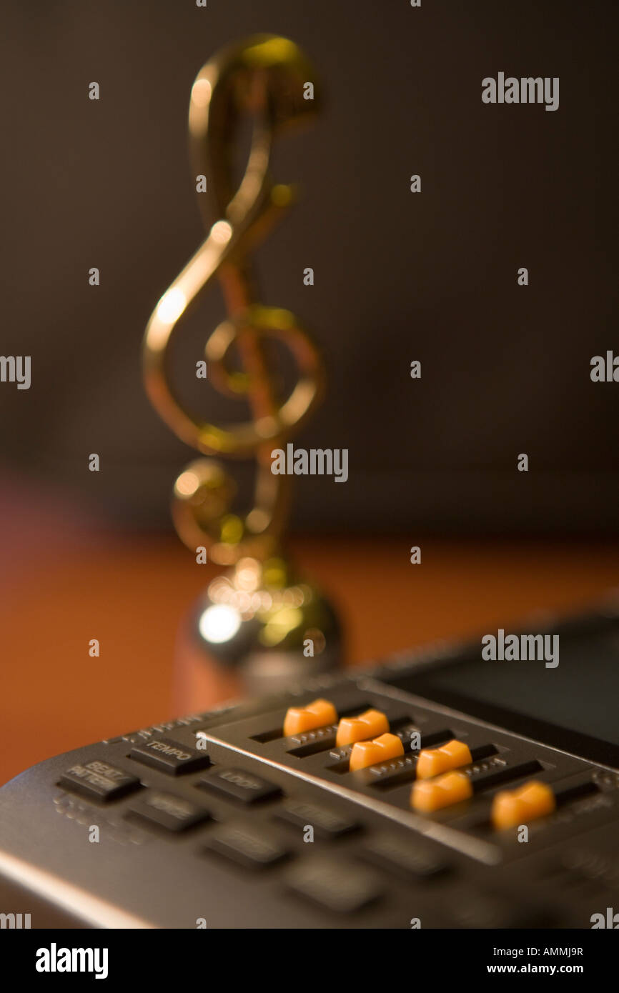 Sound station and treble clef in background Stock Photo - Alamy