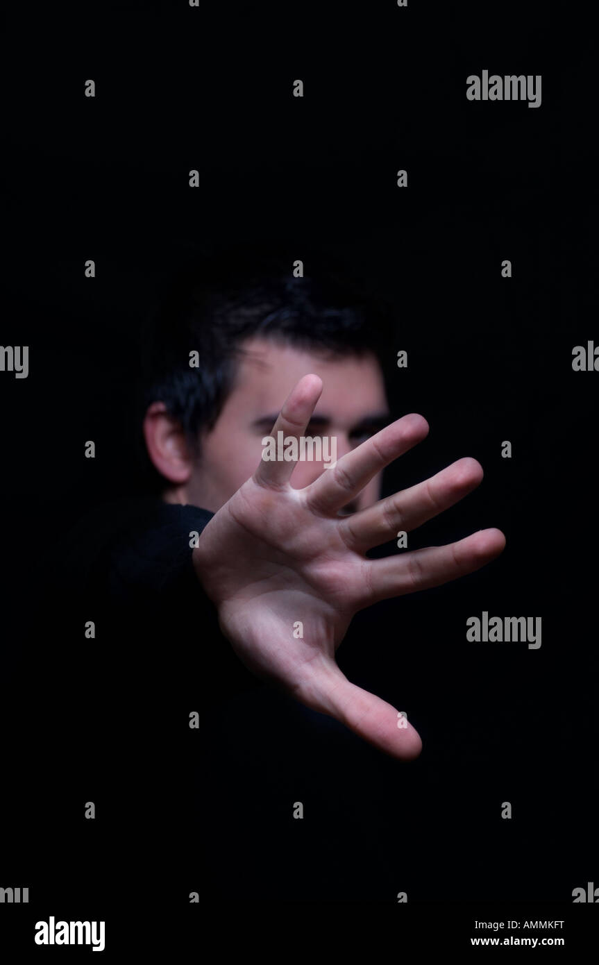 stop and stay away hand gesture Stock Photo - Alamy