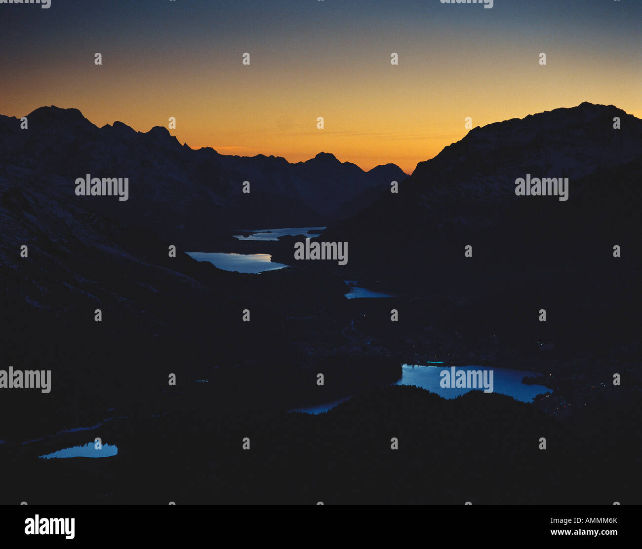 mountains and lake at dusk Stock Photo - Alamy