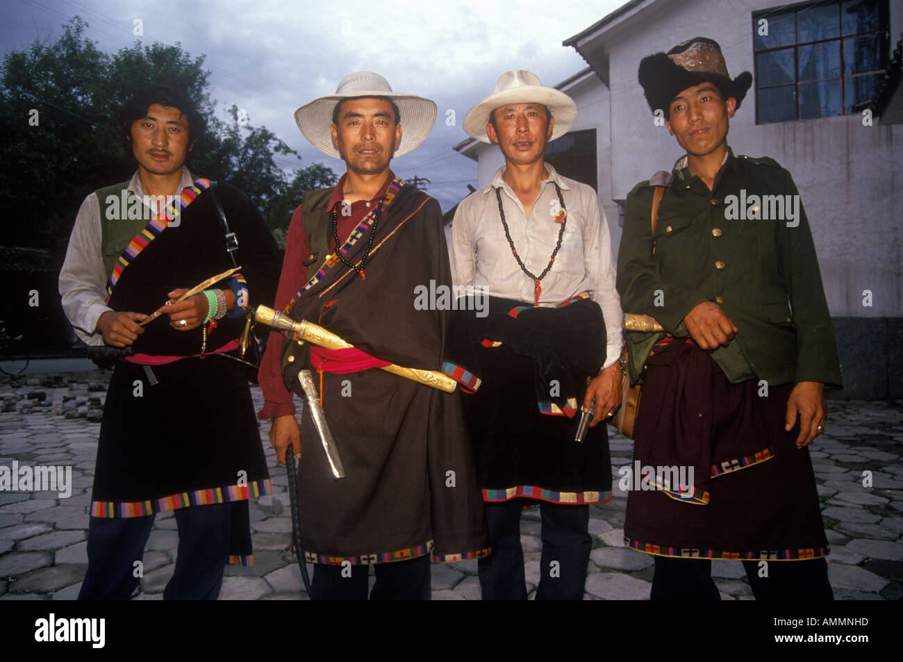Four men from Tibet in Dali Yunnan Province People s Republic of China ...