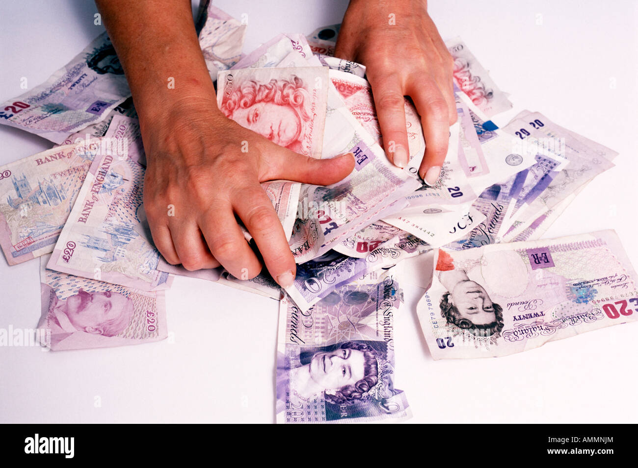 Hands grabbing British bank notes Stock Photo - Alamy