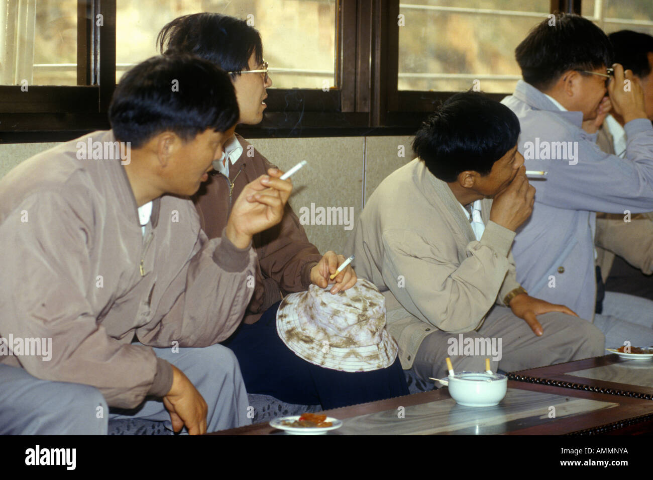Chinese smoking hi-res stock photography and images - Alamy