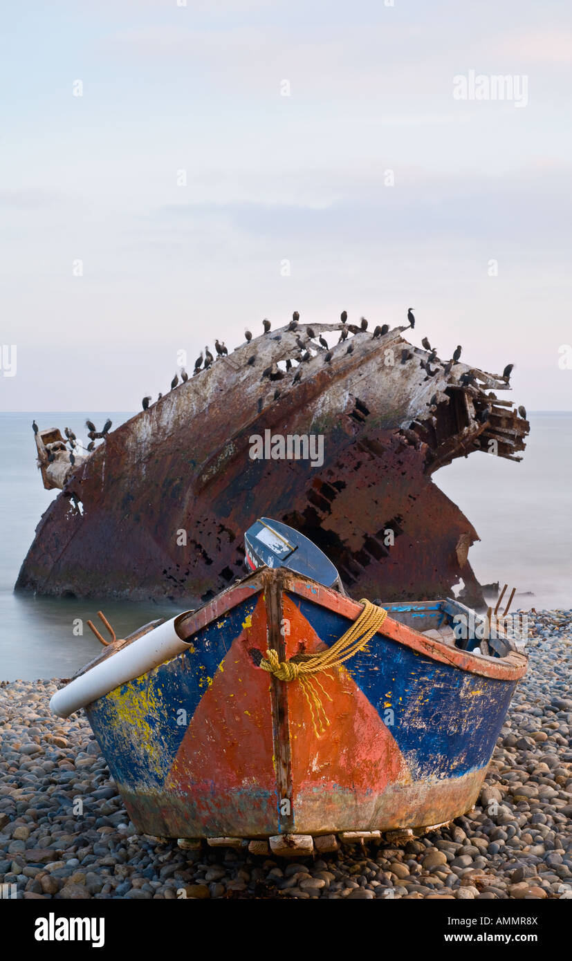small fishing boat and shipwreck at point San Jacinto, Pacific coast ...
