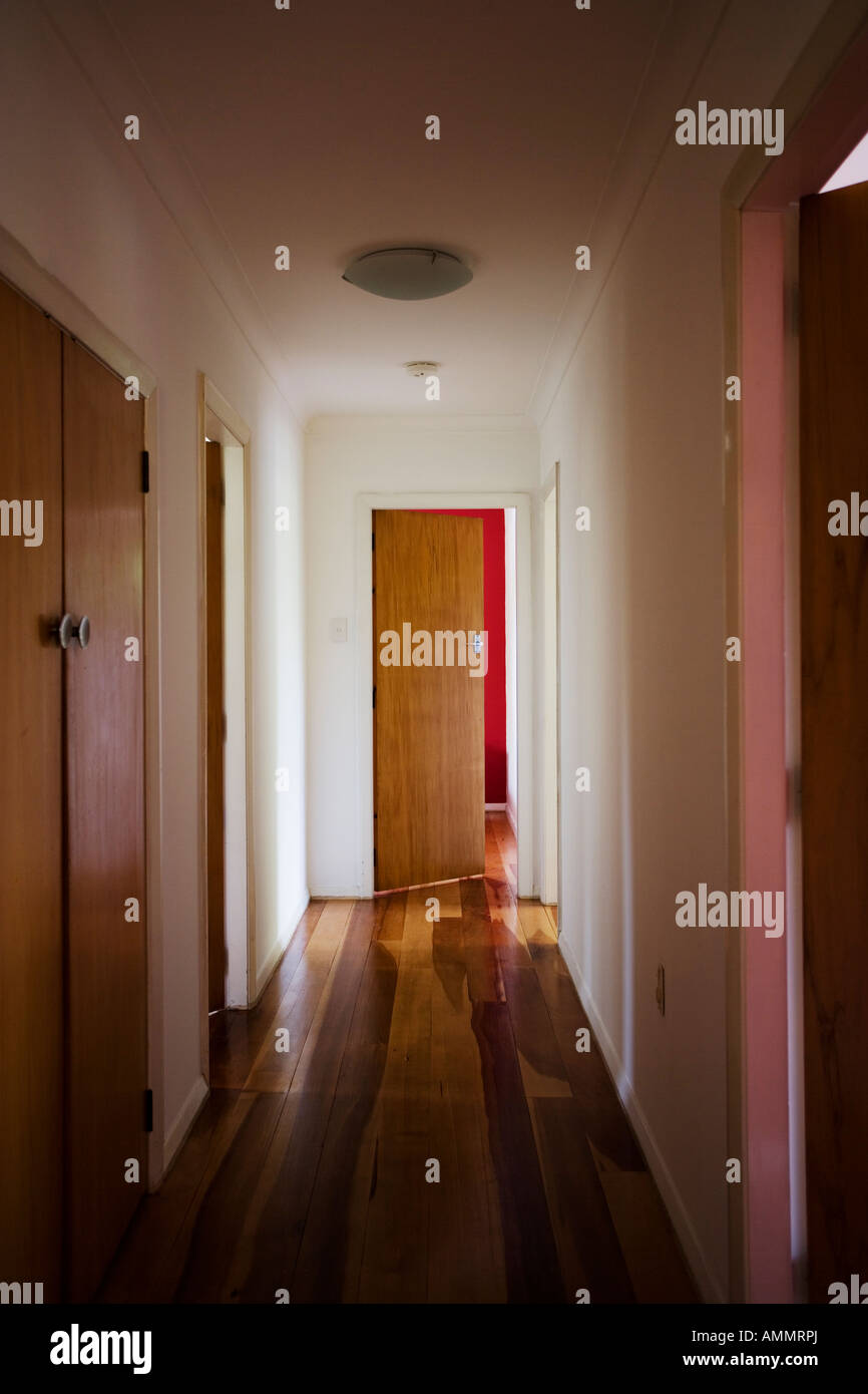 Doors at the end of hallway hi-res stock photography and images - Alamy