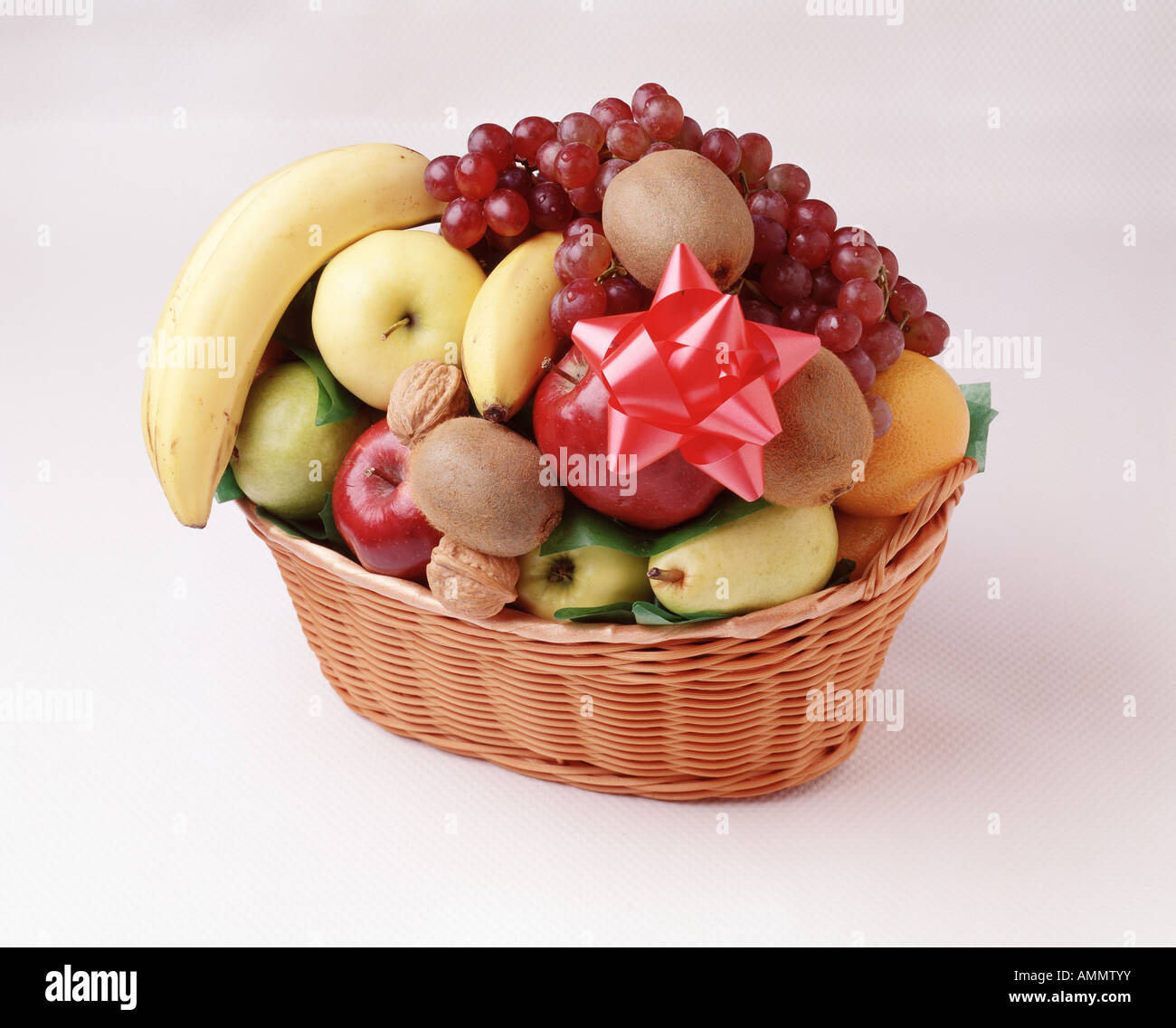 holiday gift fruit basket fresh fruit nuts apple grapes banana Stock ...