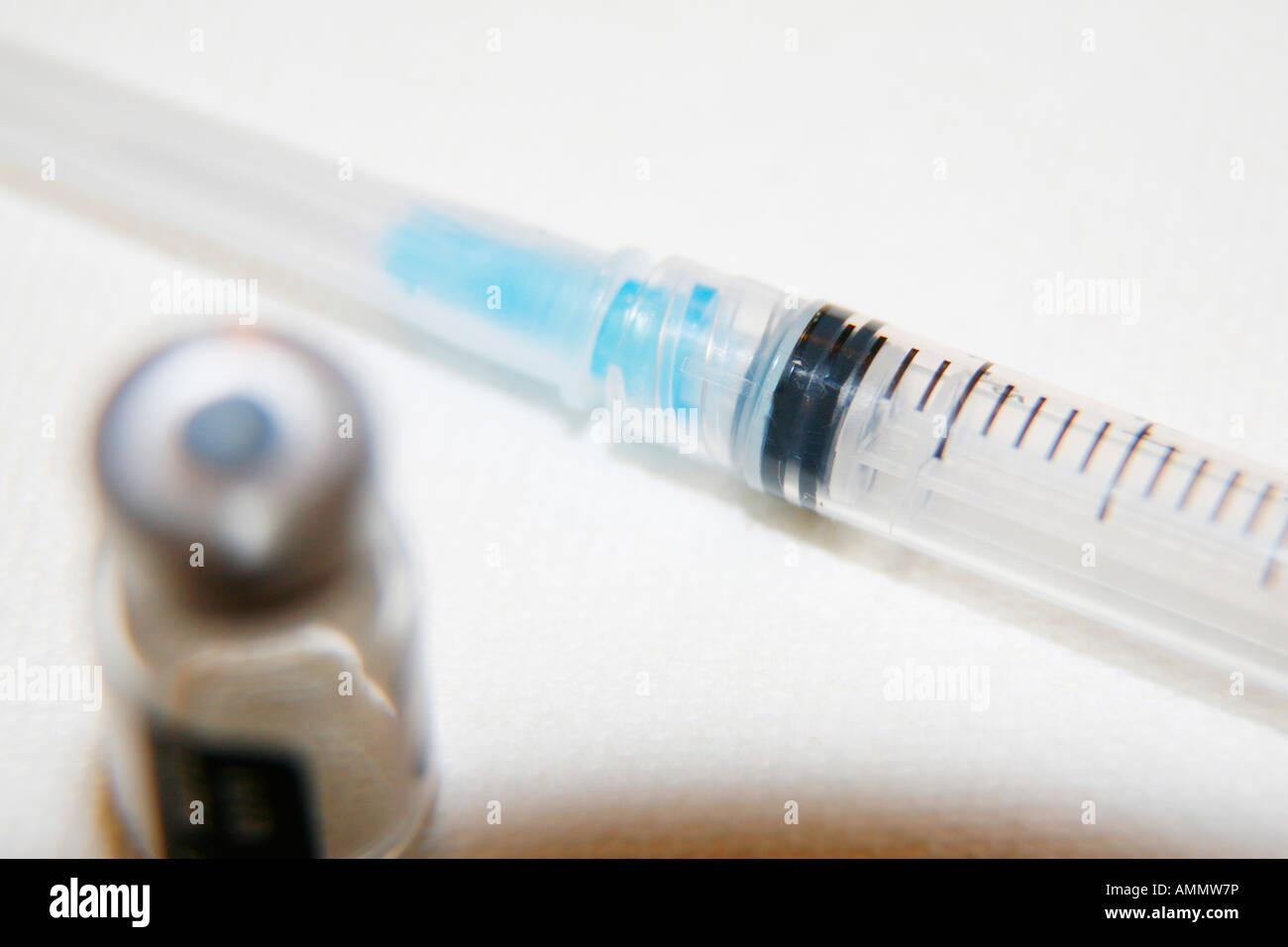 Hypodermic needle in use Stock Photo - Alamy